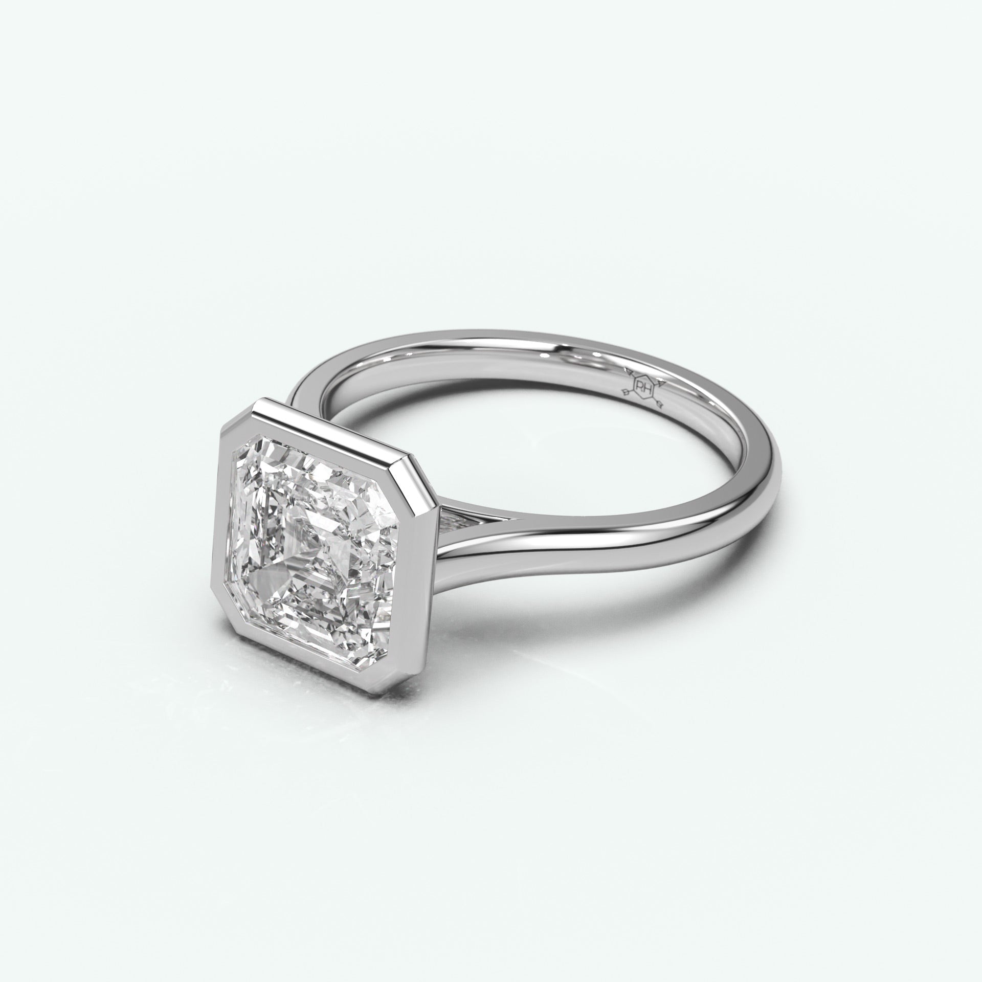 The Adele Sleek Bezel Diamond Engagement Ring